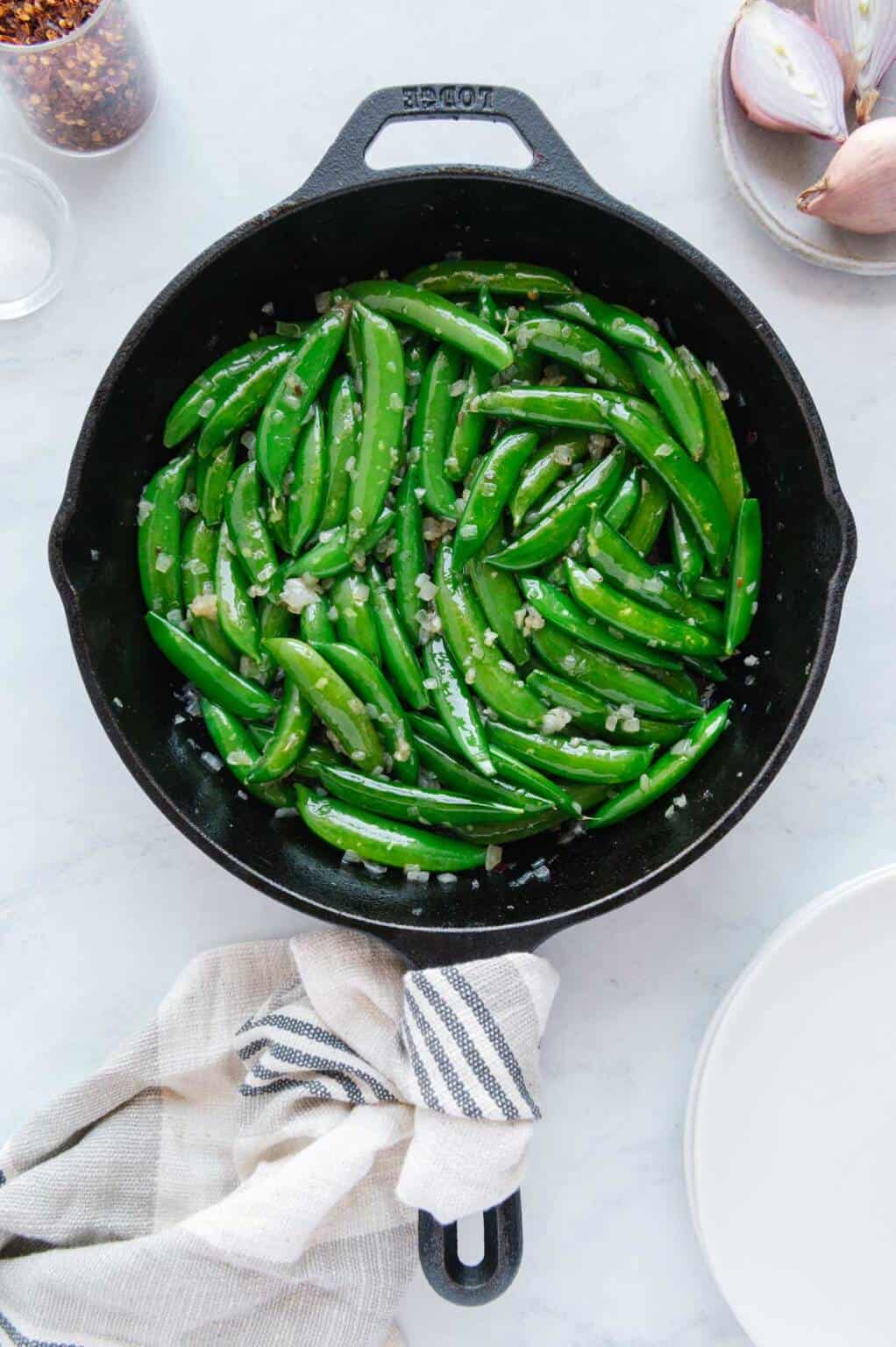 Easy Sautéed Sugar Snap Peas with Garlic and Shallot - Eating by Elaine