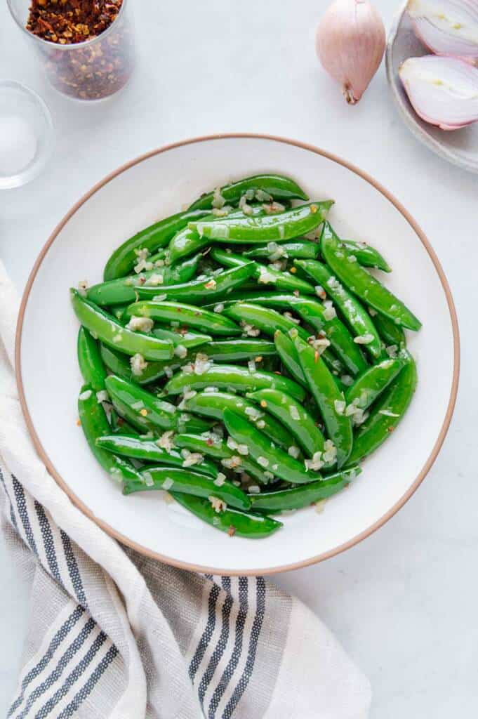 Easy Sautéed Sugar Snap Peas with Garlic and Shallot - Eating by Elaine